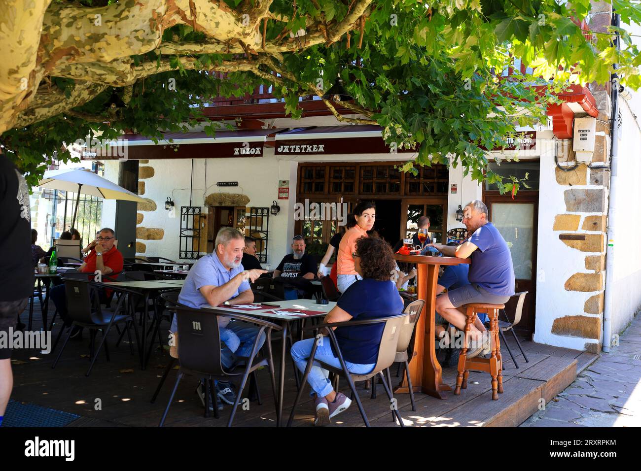 Bera, Navarre,Spain- August 14, 2023: Bar terrace with beautiful trees ...