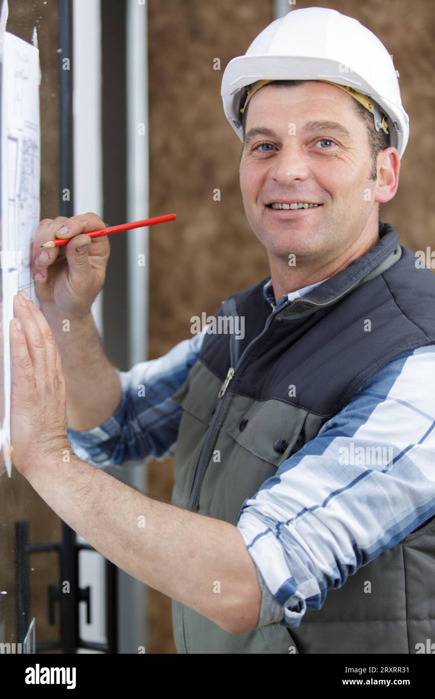 Construction worker drawing on hi-res stock photography and images - Alamy