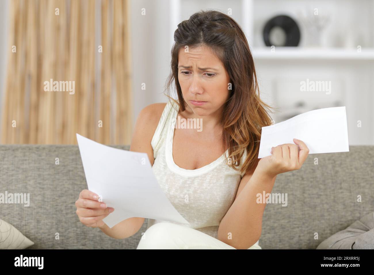 Worried girl reading results hi-res stock photography and images - Alamy