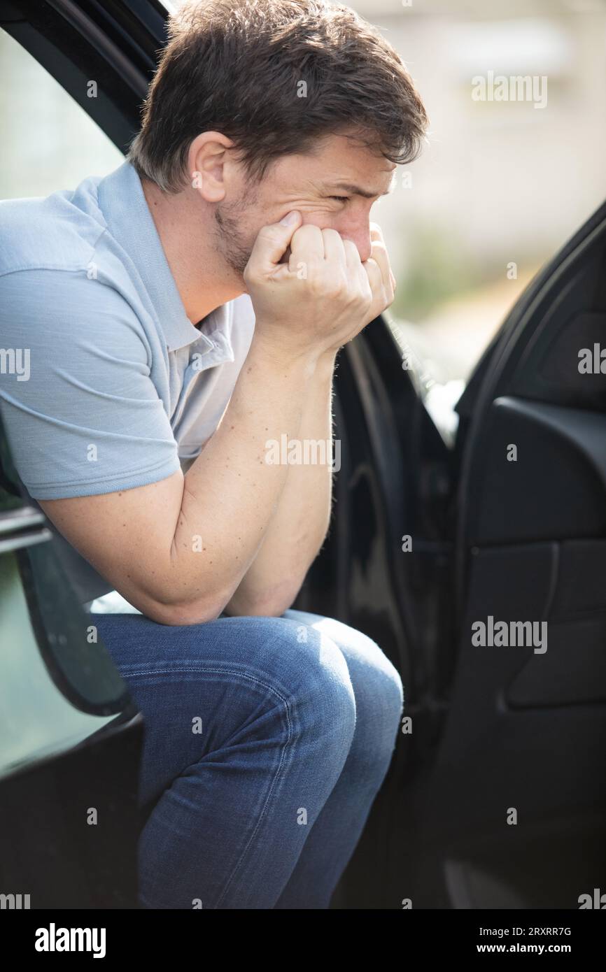 Scared man in car hi-res stock photography and images - Alamy