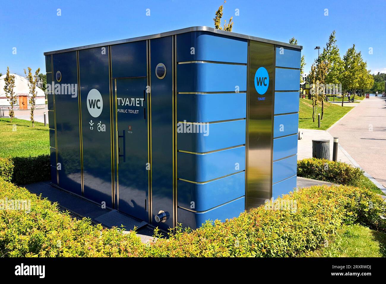 Modern outdoor toilet exterior. public Toilet in center of big city ...