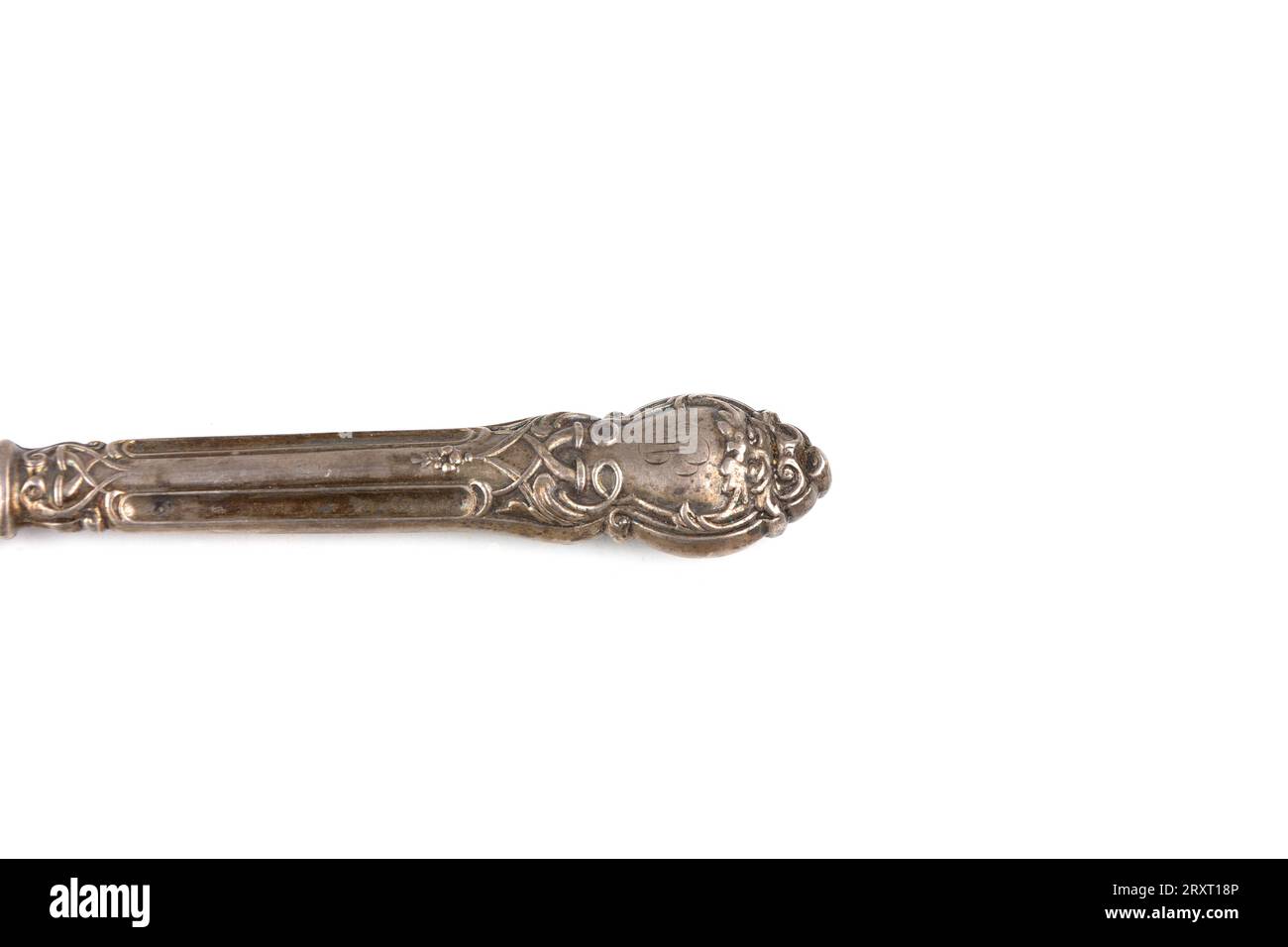 vintage silver spoon used for praline and sugar isolated on white ...