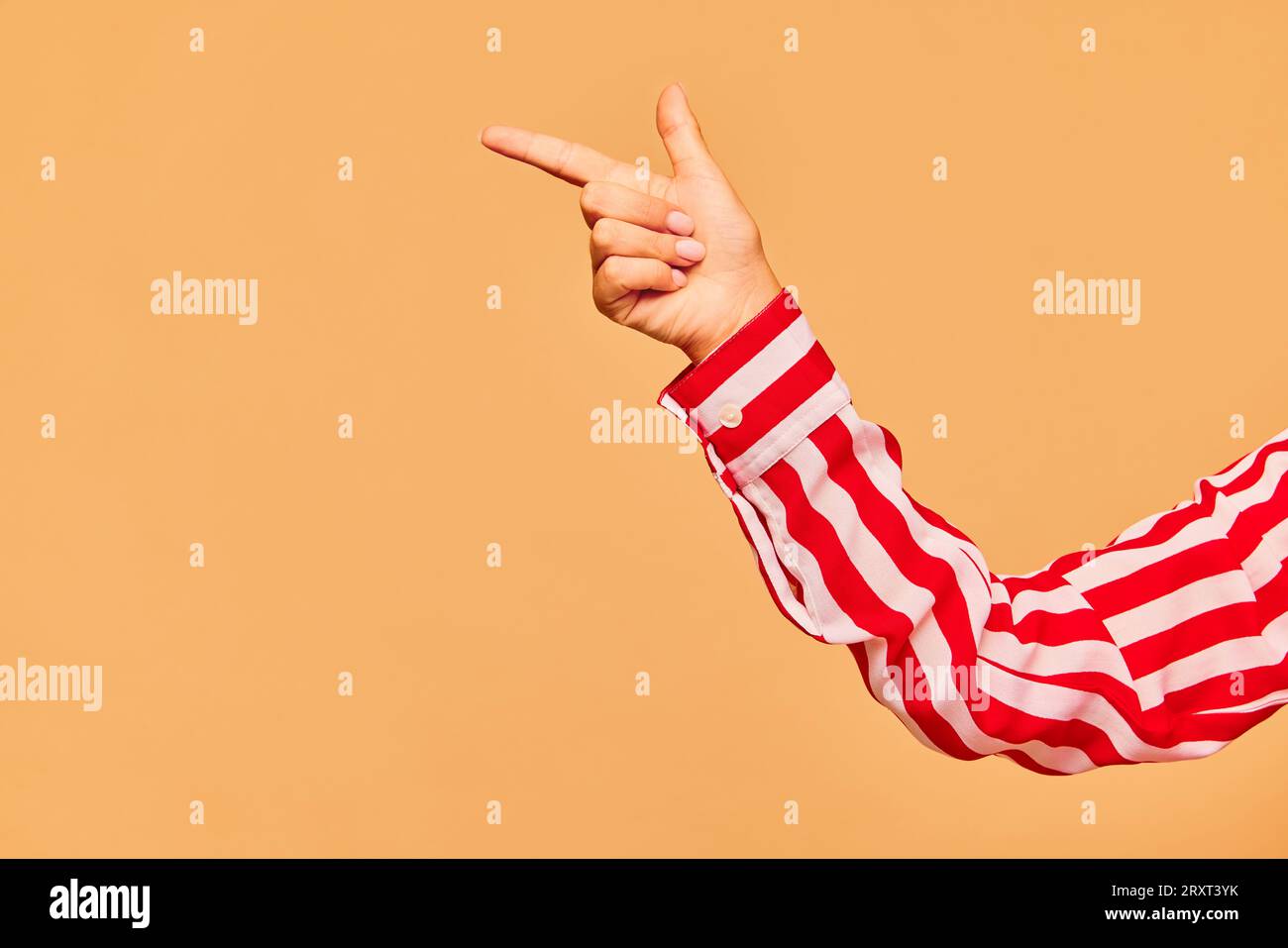 Poster. Female hand showing thumb extended up and index finger extended ...