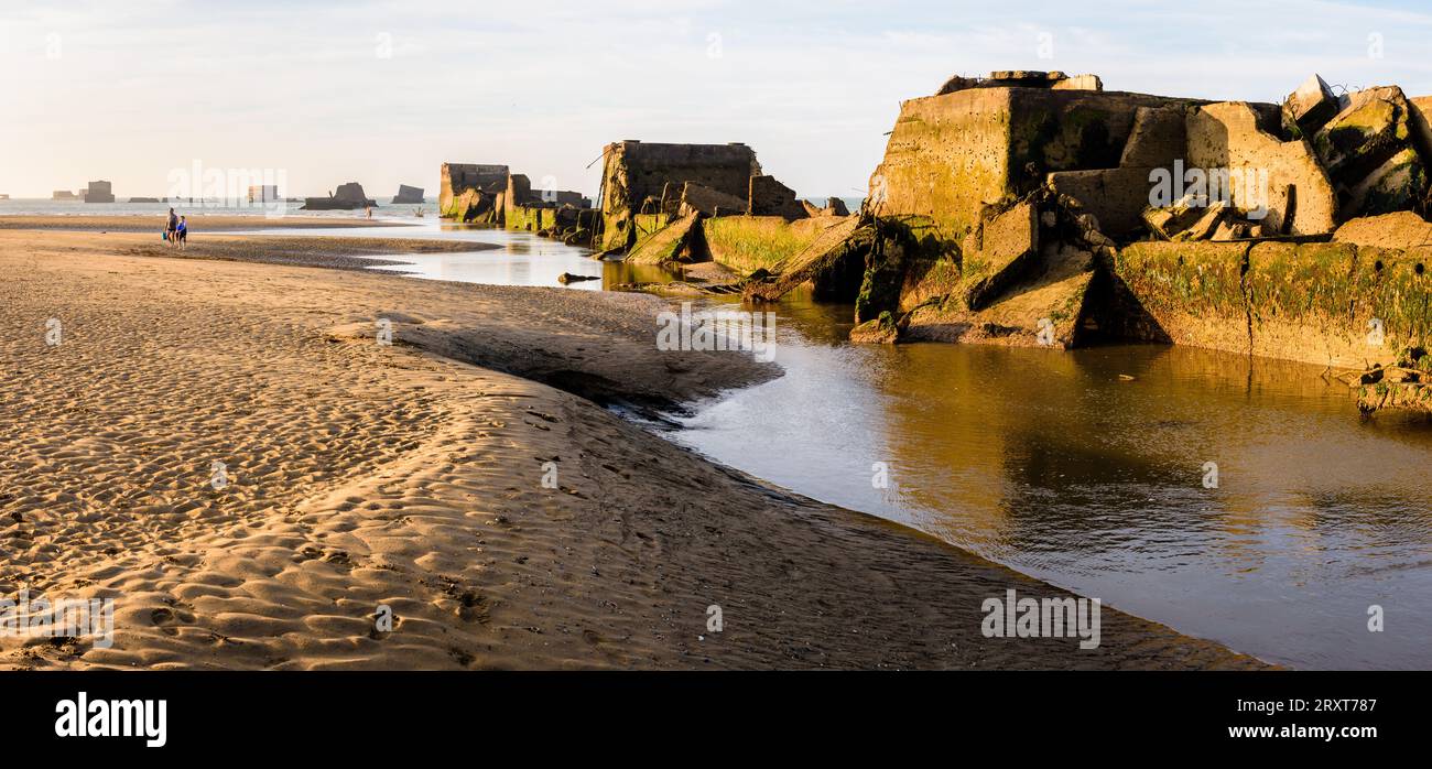 Remains of Phoenix caissons on the sand, used to build the Mulberry ...