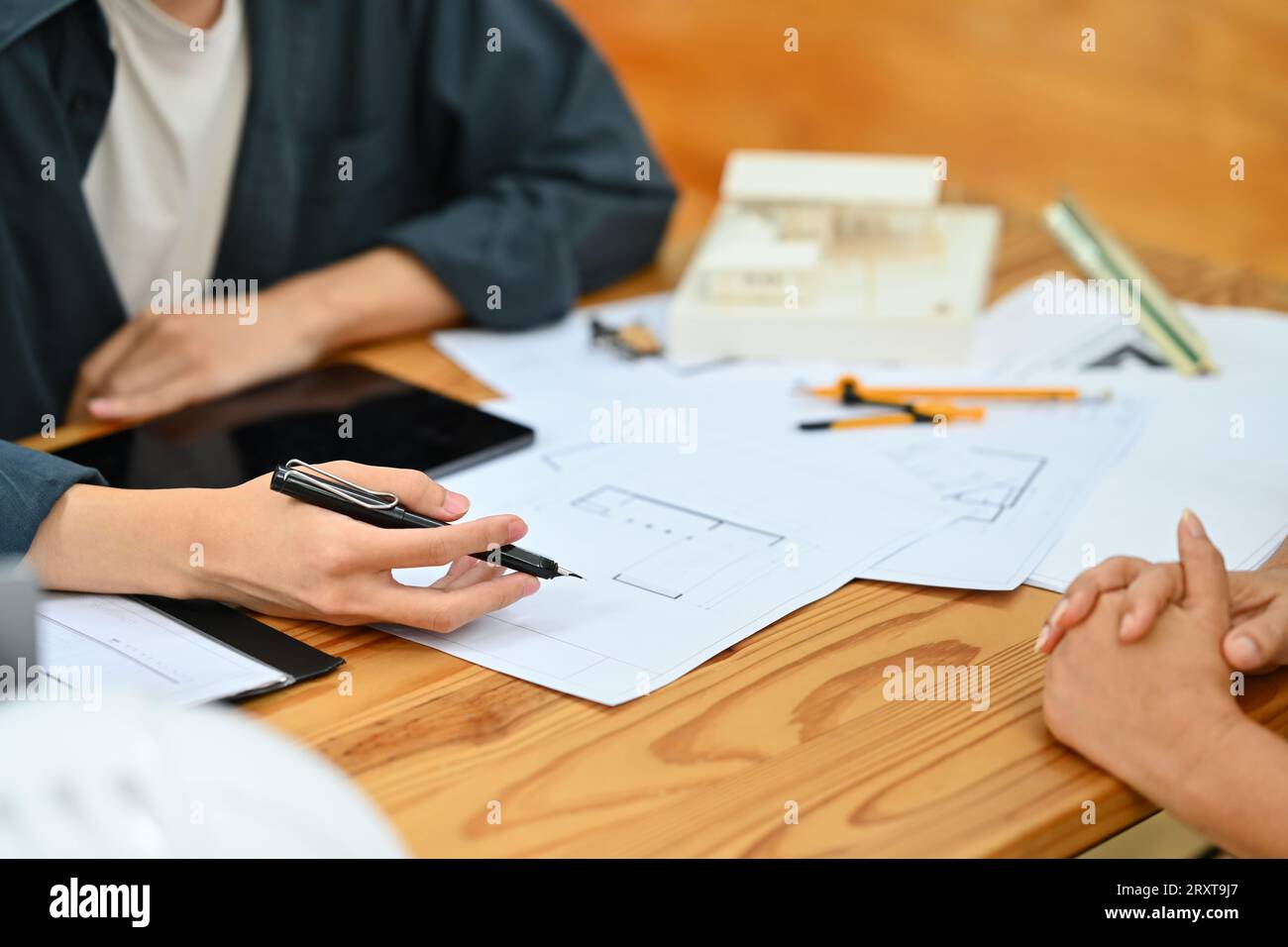 Architect plans house client hi-res stock photography and images - Alamy