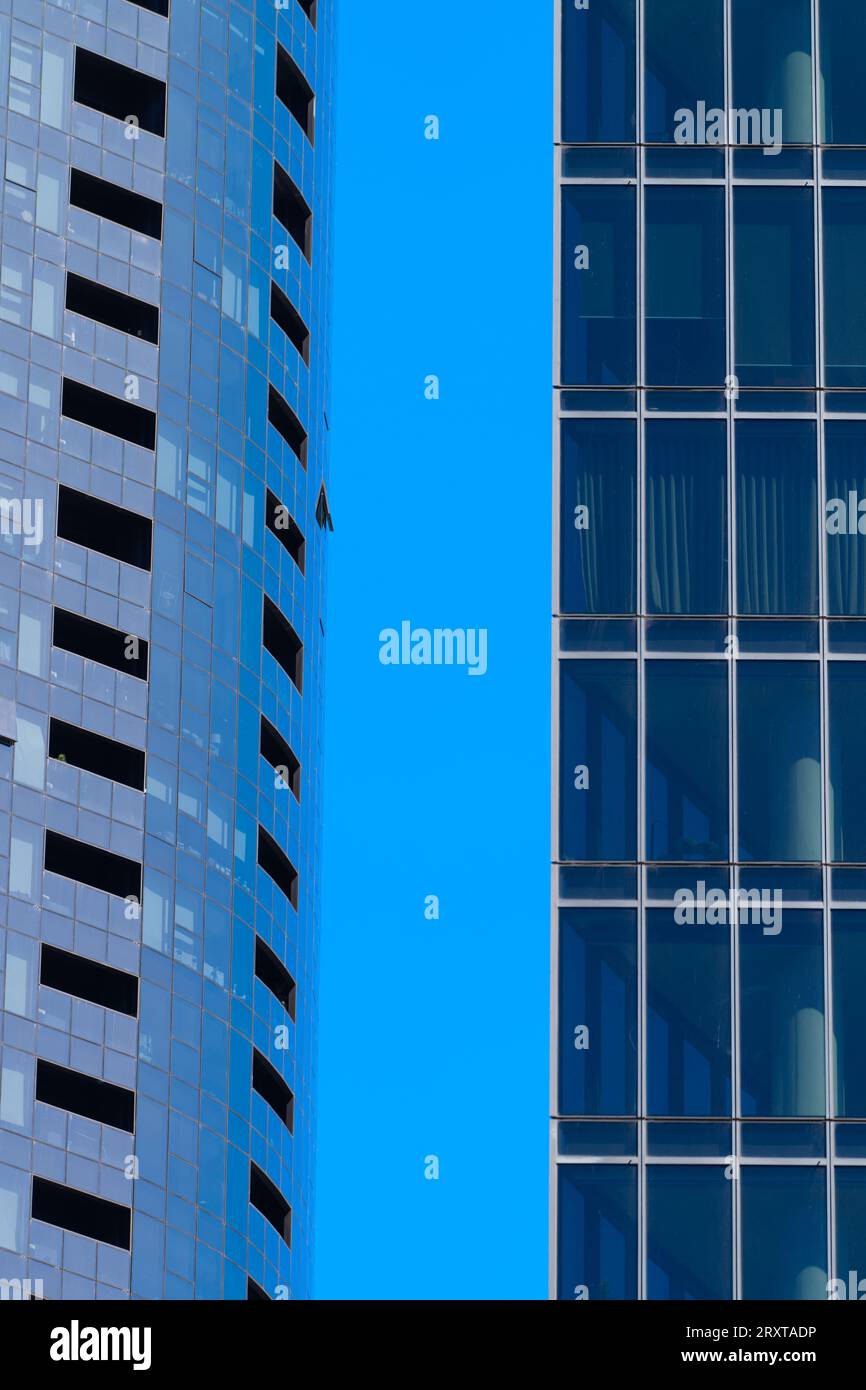 Modern city building apartment block with balconies, windows and glass ...