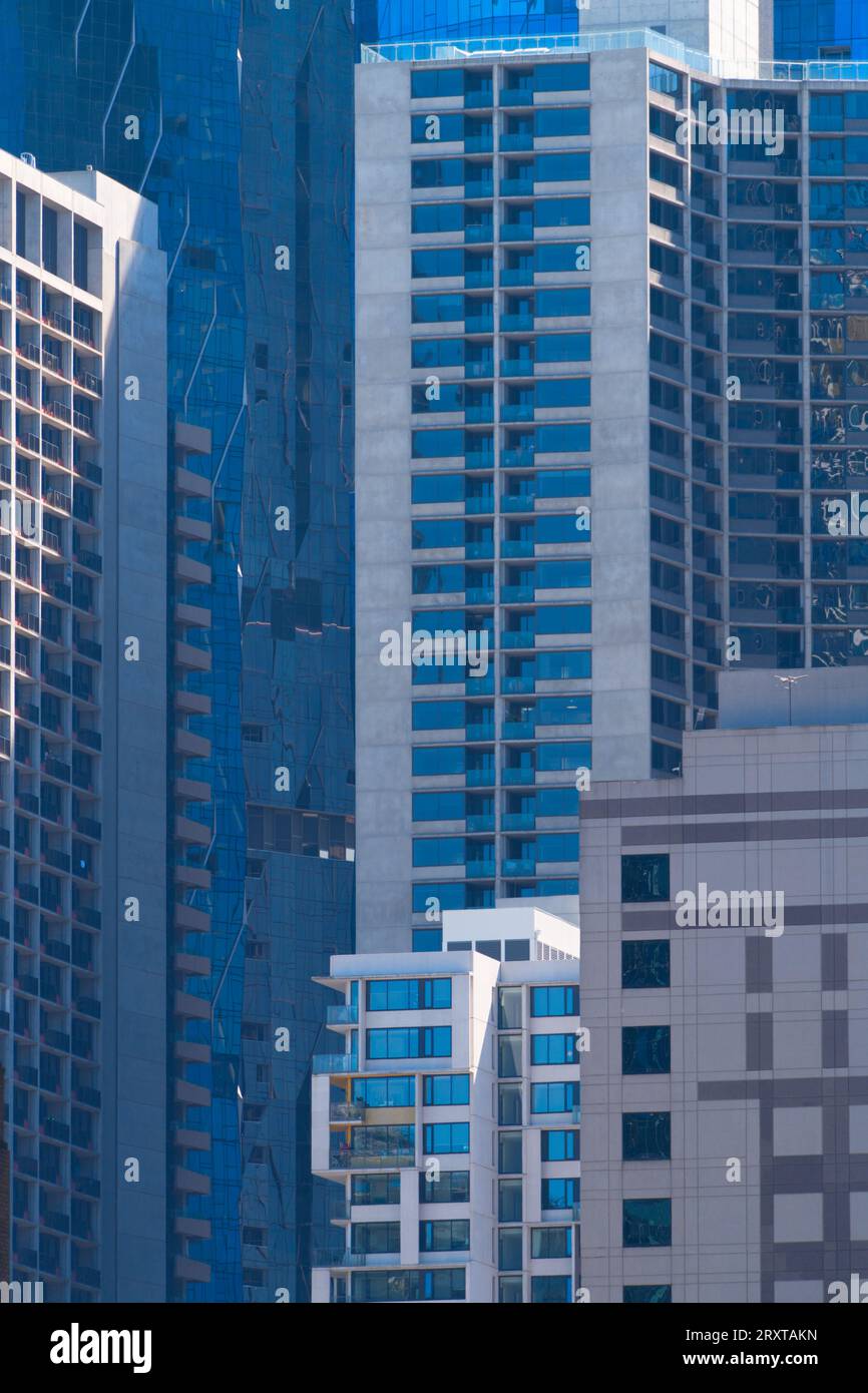 Modern city building apartment block with balconies, windows and glass ...