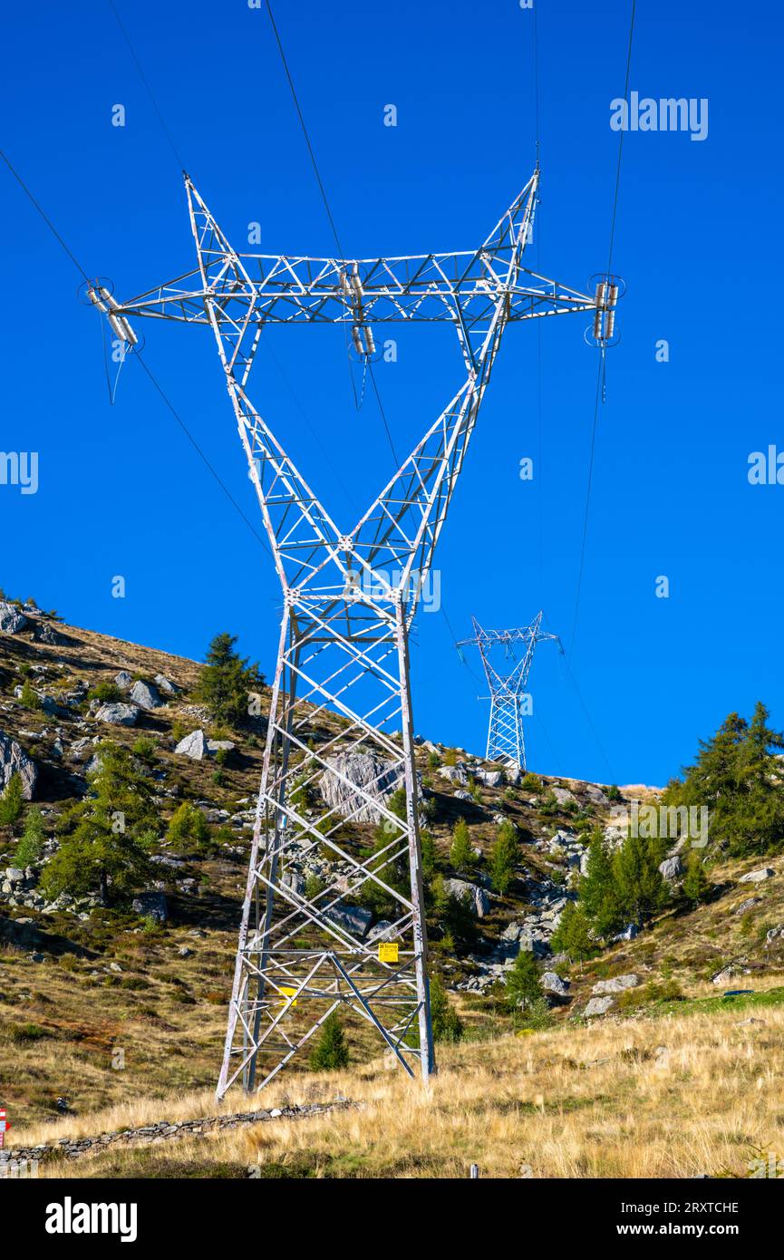 Electricity pylons, in a mountain place. Origin, transport and need for ...