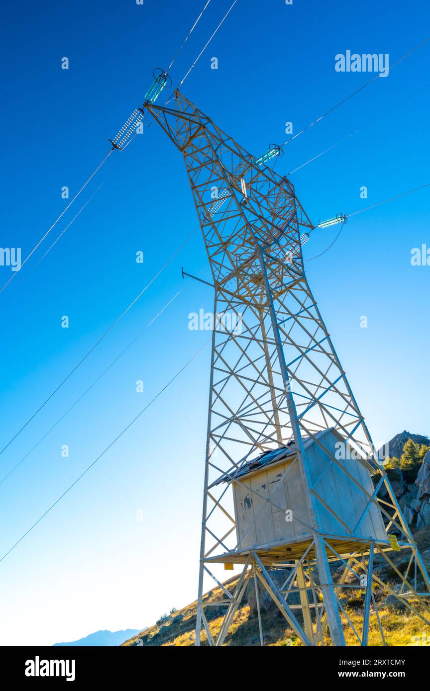 Electricity pylons, in a mountain place. Origin, transport and need for ...