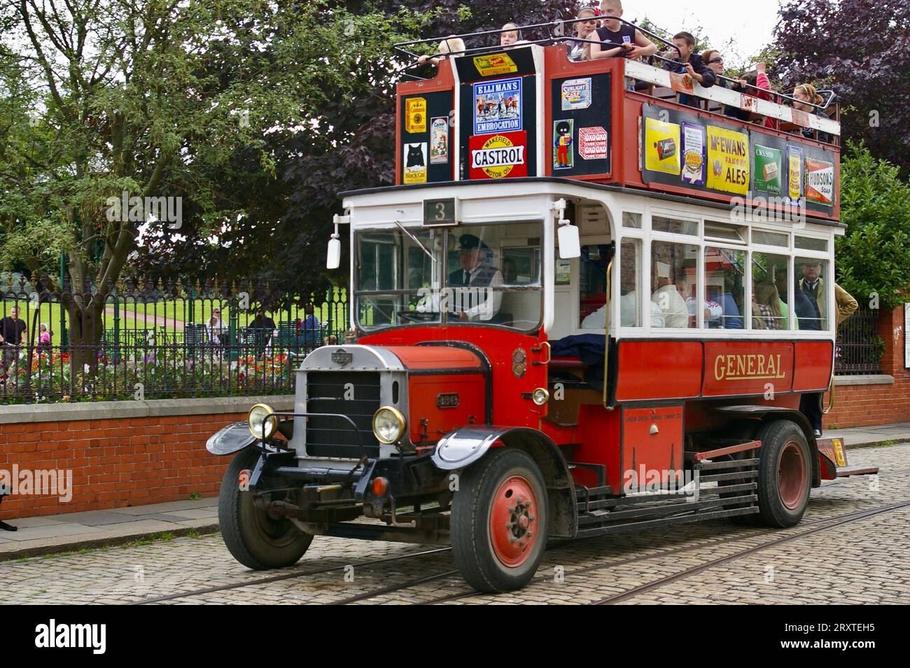 August 23, 2010. Red B-Type replica bus B1349 on cobbled road with ...