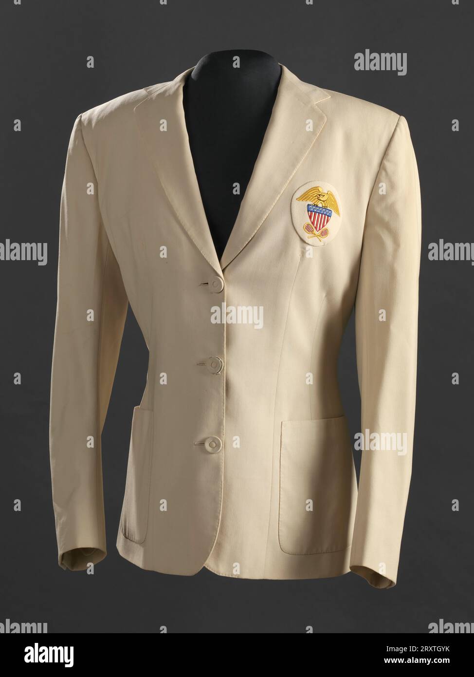 Off-white blazer featuring an embroidered American shield over crossed ...