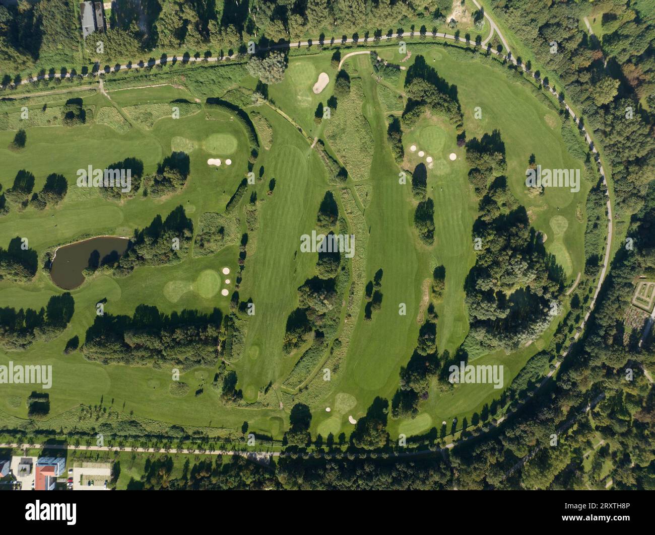 Aerial top down drone view of a golf course, leisure sports activities ...