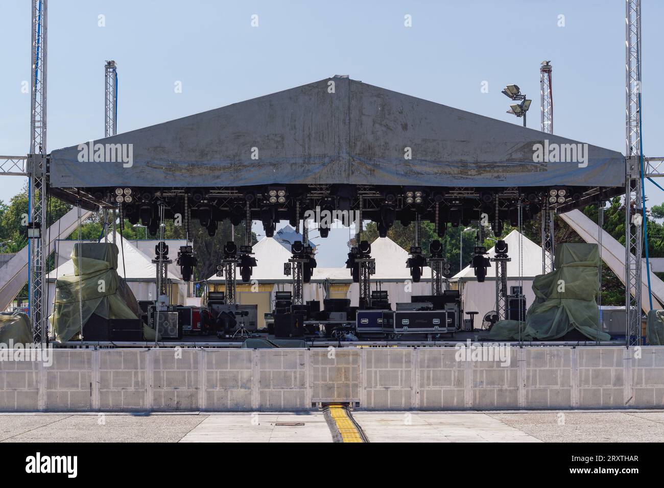 Empty outdoor real concert stage including robotic scenic lights setup ...