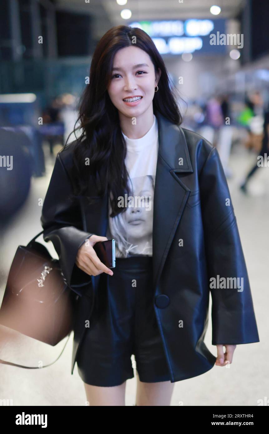 Hong Kong actress and fashion model Janice Man appears at the airport ...