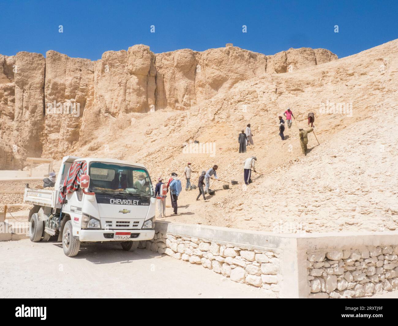Workers excavating a new site in the Valley of the Kings, where for a ...