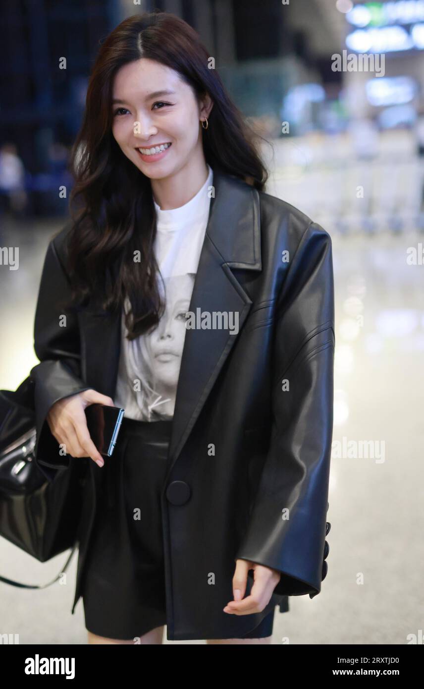 Hong Kong actress and fashion model Janice Man appears at the airport ...