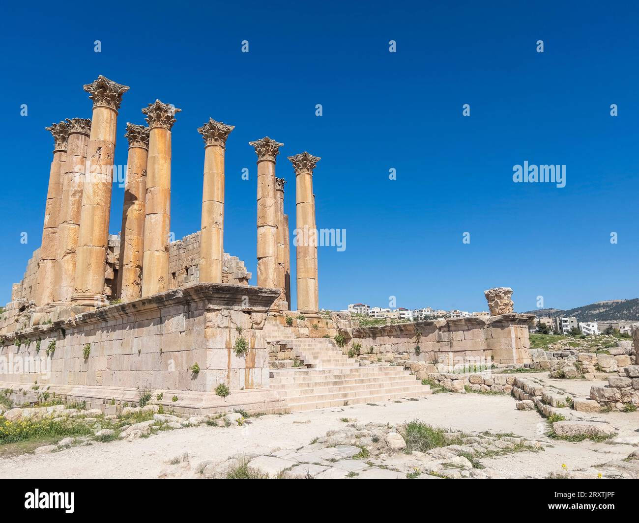 Columns frame a building in the ancient city of Jerash, believed to be ...