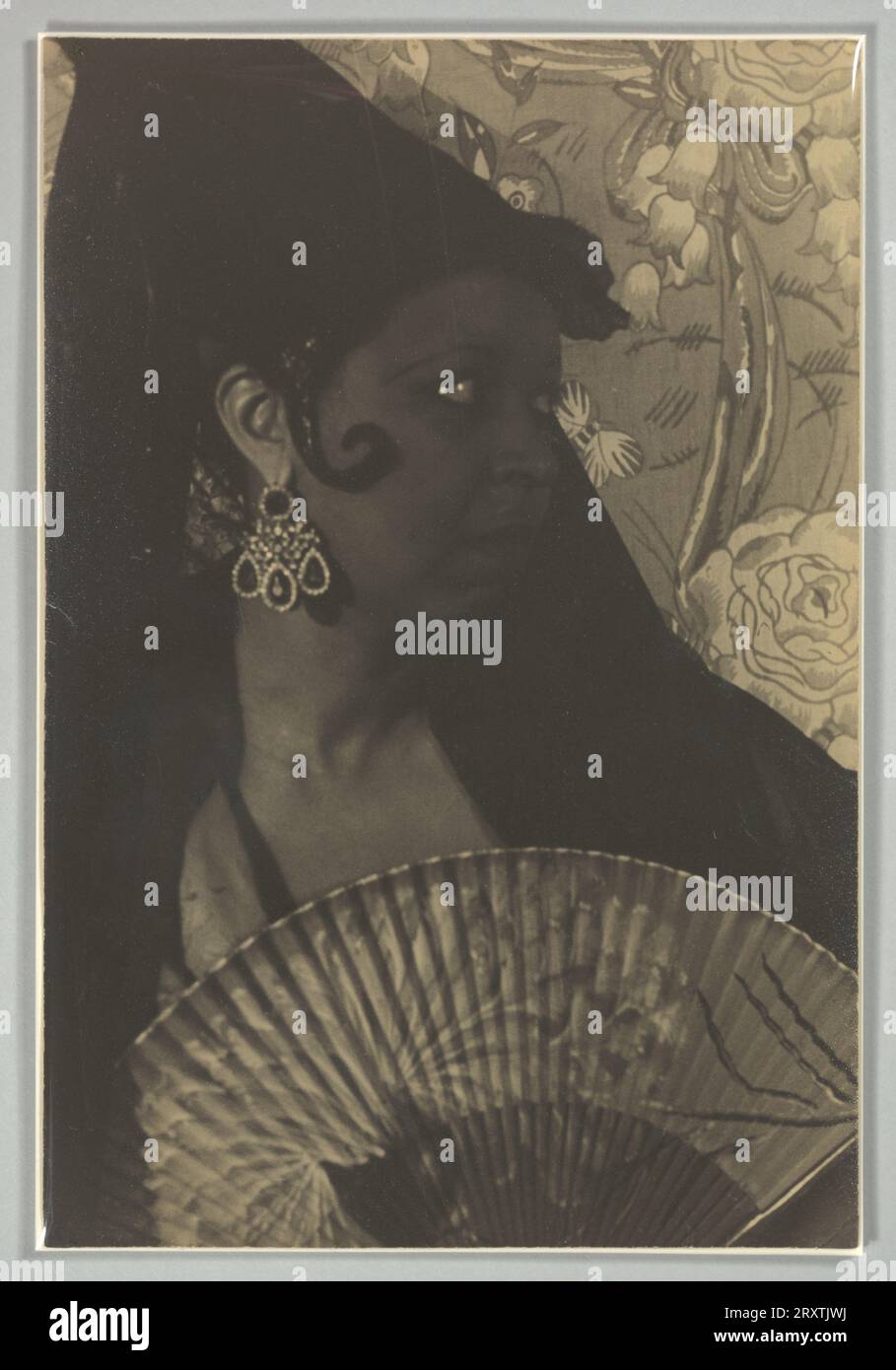 A black-and-white photograph of Ethel Waters set against a floral ...