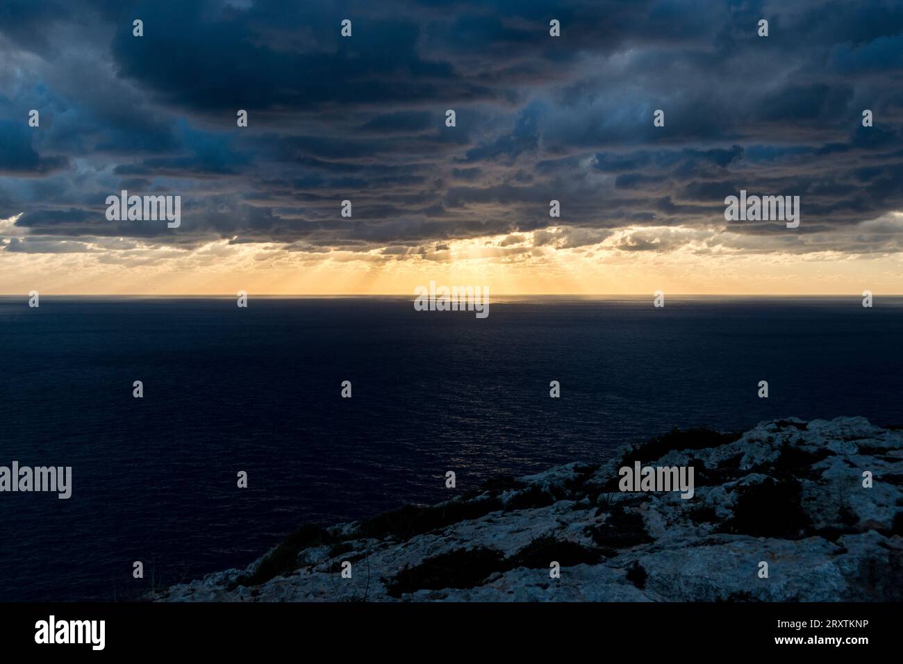 Sunset at Dingi cliffs, Malta island Stock Photo - Alamy