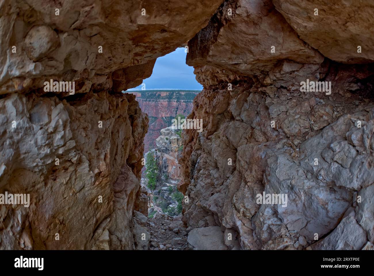 A gap between a stack of balanced boulders on a cliff east of Grandview ...