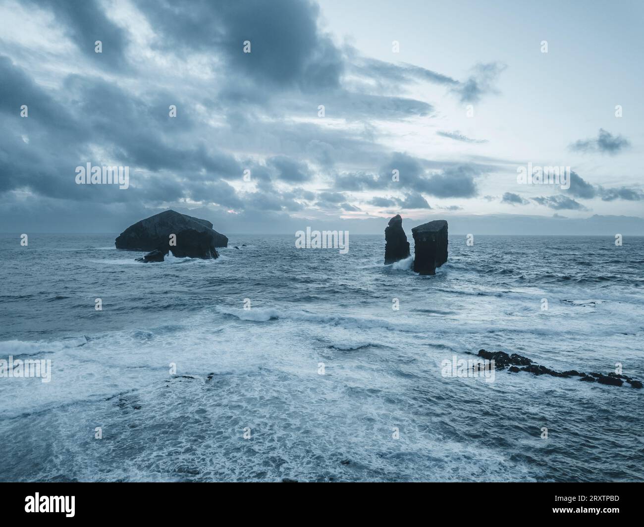 Aerial view of Mosteiros sea stacks with a stormy ocean, Sao Miguel ...