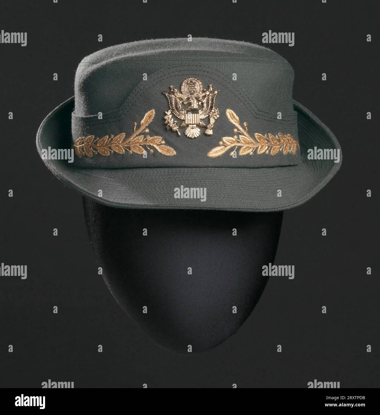 Military dress uniform comprised of a jacket with service ribbons and ...