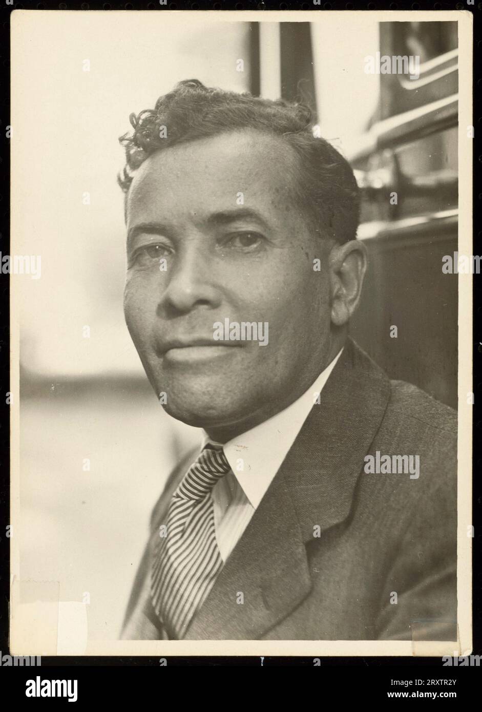 Lewis W. Hine. A gelatin silver print of a man, hair parted on his left ...
