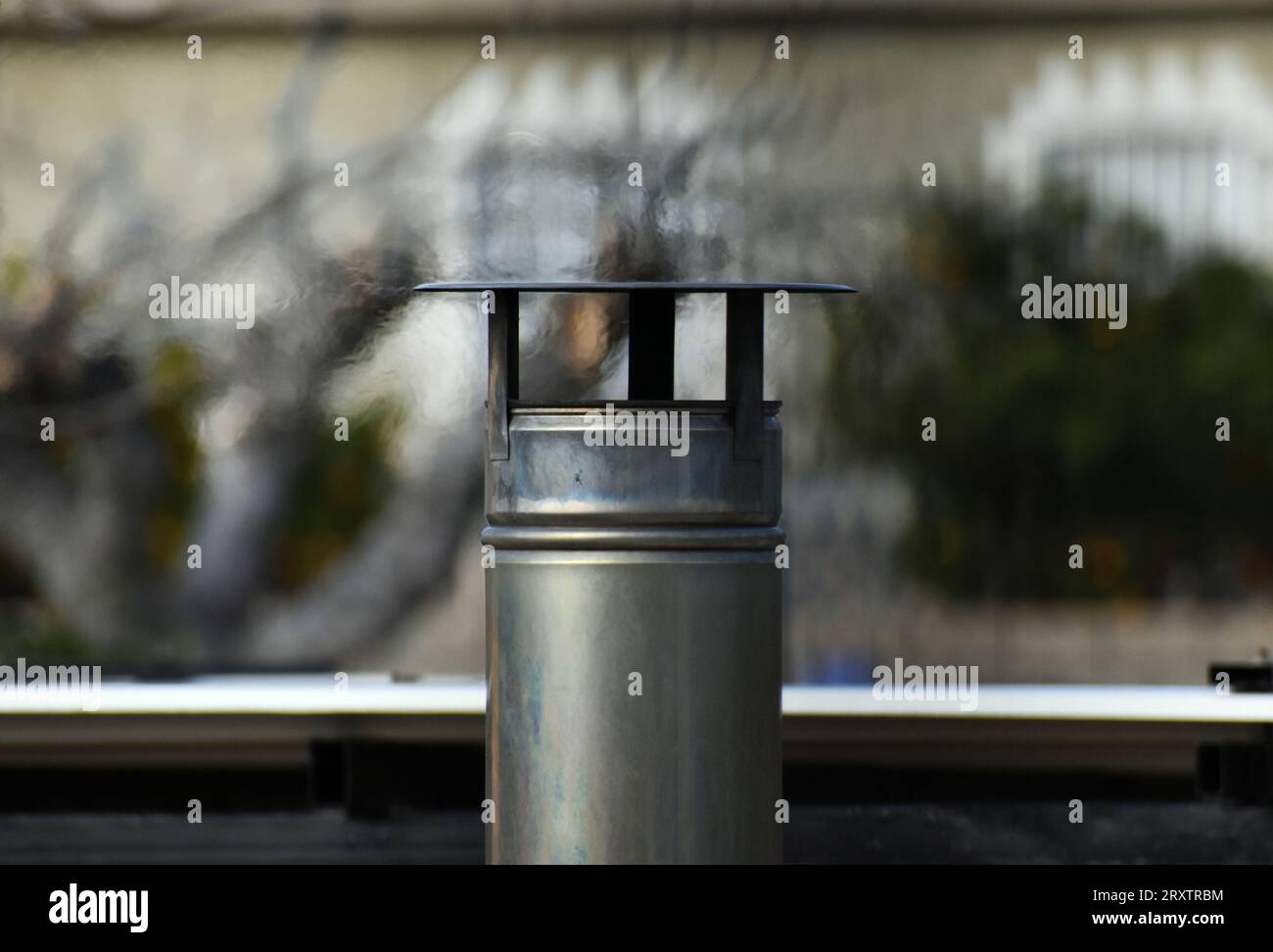 Industrial Rooftop Ventilation: Metal Chimney Exit Stock Photo - Alamy