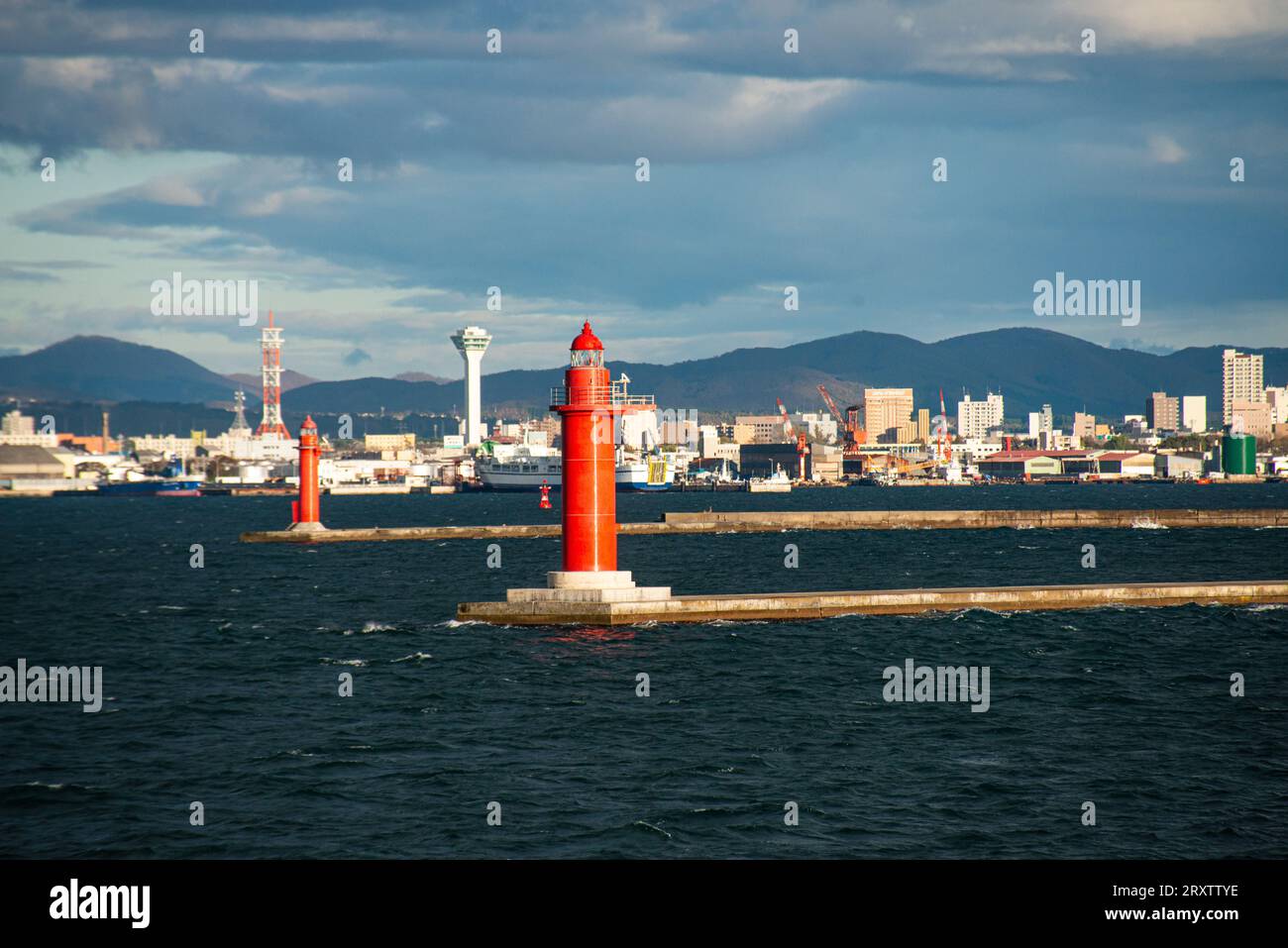 Red lighthouse in front of the harbor of Hakodate, Hokkaido, Japan ...