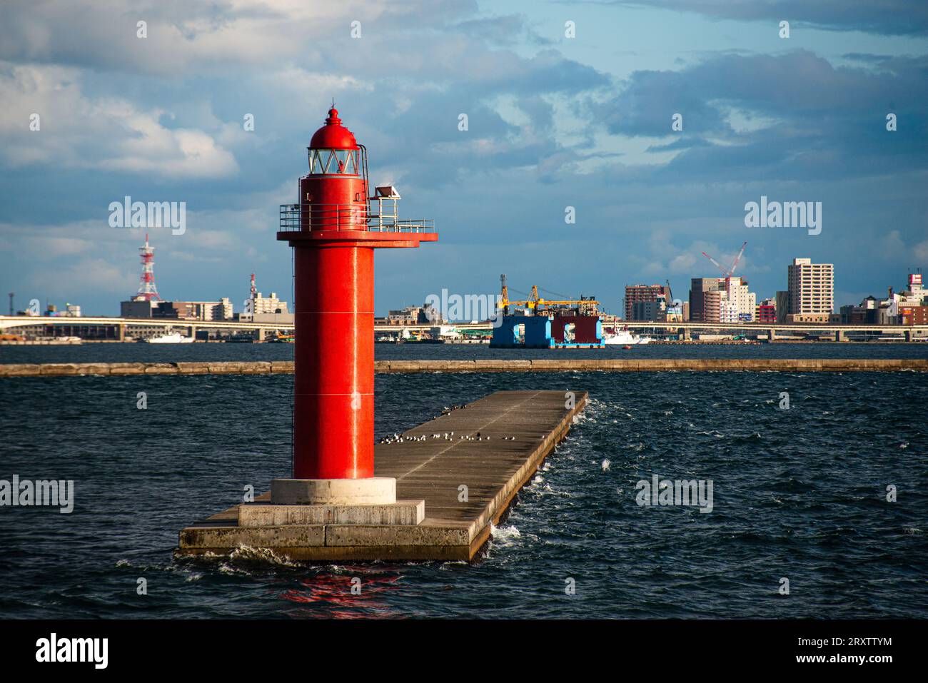 Red lighthouse in front of the harbor of Hakodate, Hokkaido, Japan ...