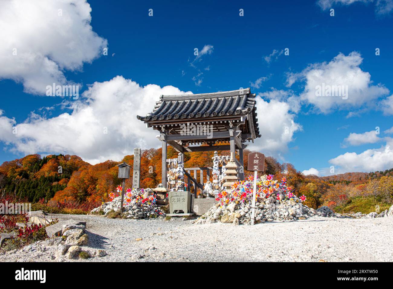 Little shrine in a volcanic landscape and autumnal colors, Osorezan ...