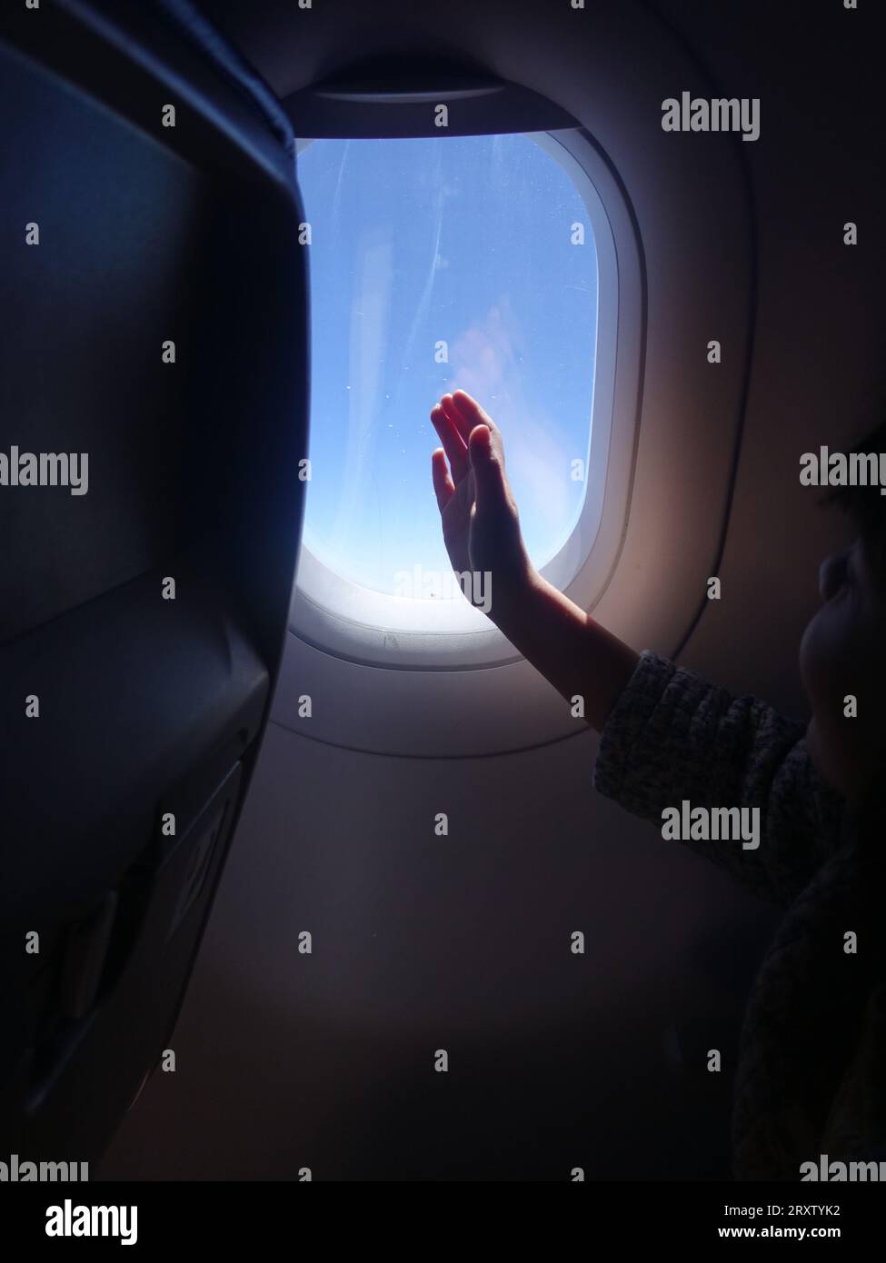 Hand window sky flying hi-res stock photography and images - Alamy