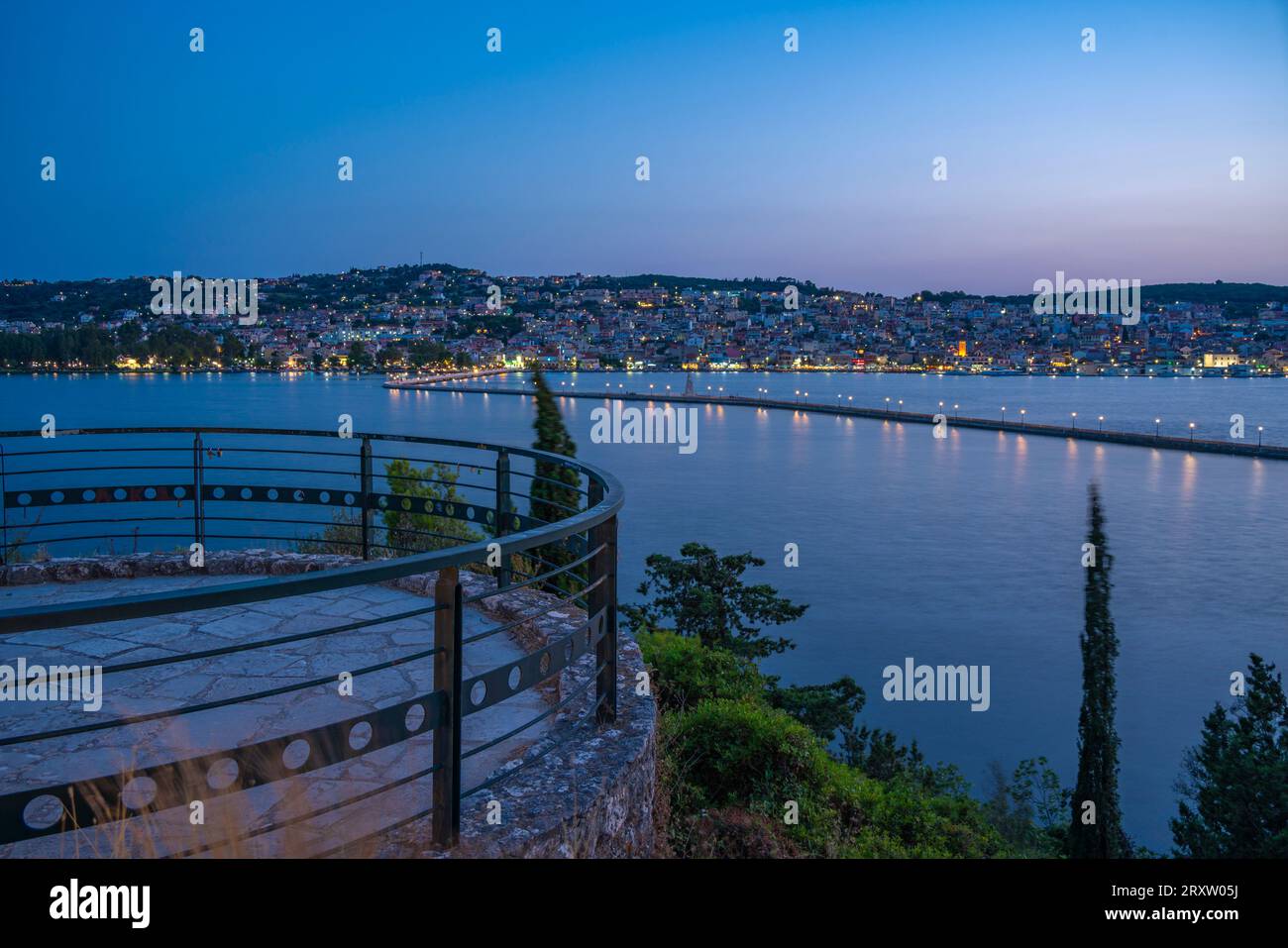 View of Argostoli, capital of Cephalonia and De Bosset Bridge at dusk ...