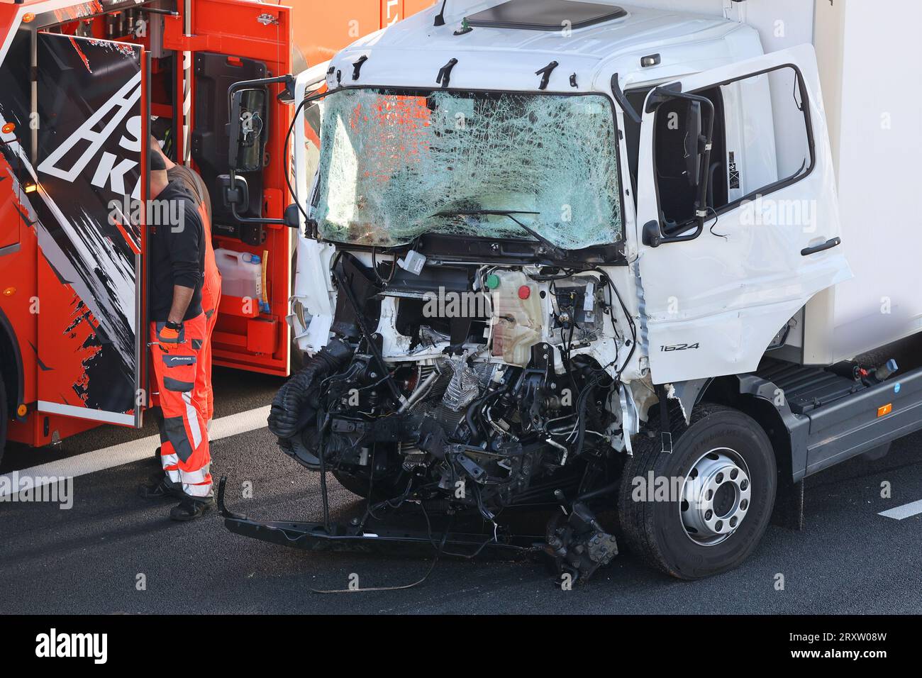 27 September 2023, Hamburg: A badly damaged truck stands on the ...