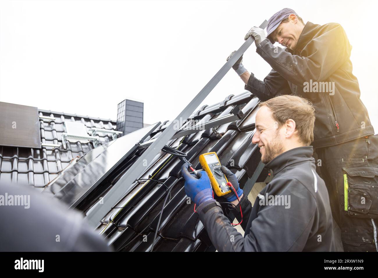 Team technicians installing testing hi-res stock photography and images ...
