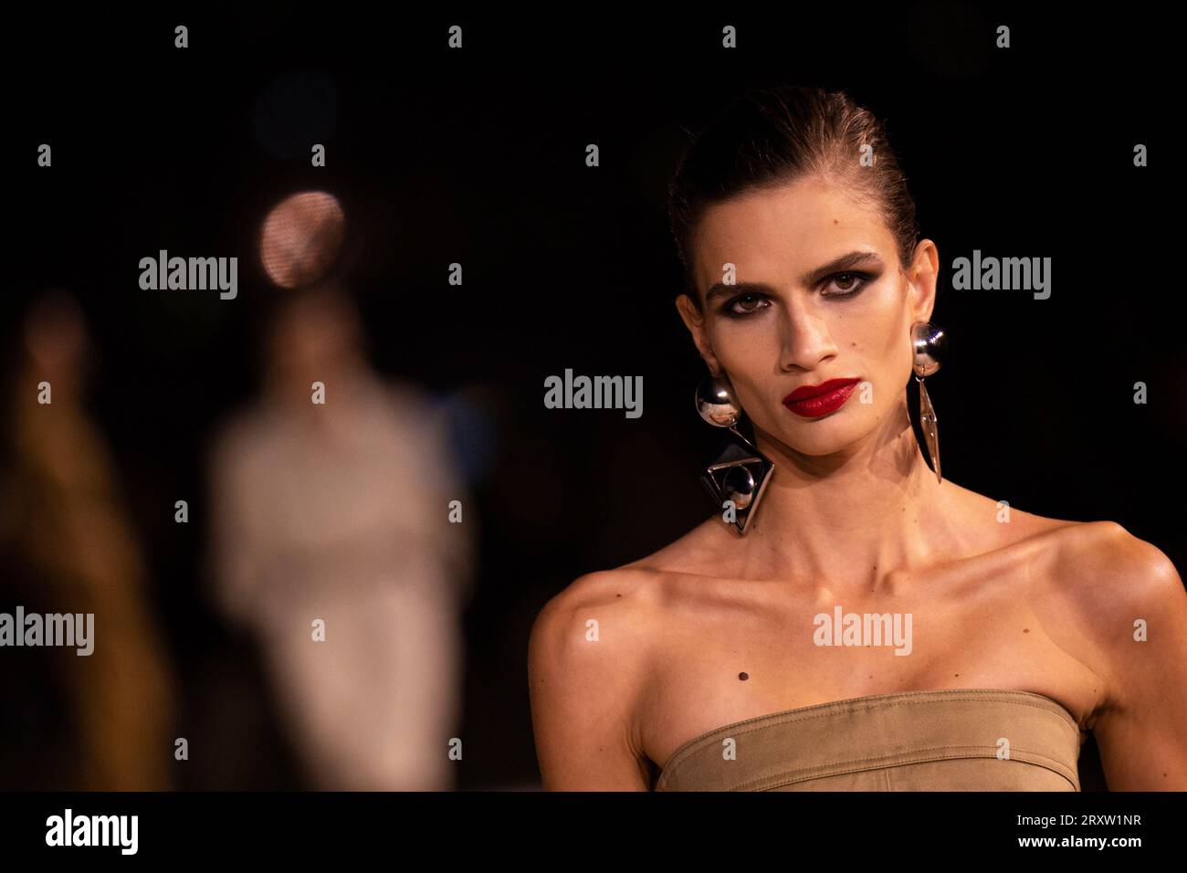 A model wears a creation for the Yves Saint Laurent Spring/Summer 2024 ...