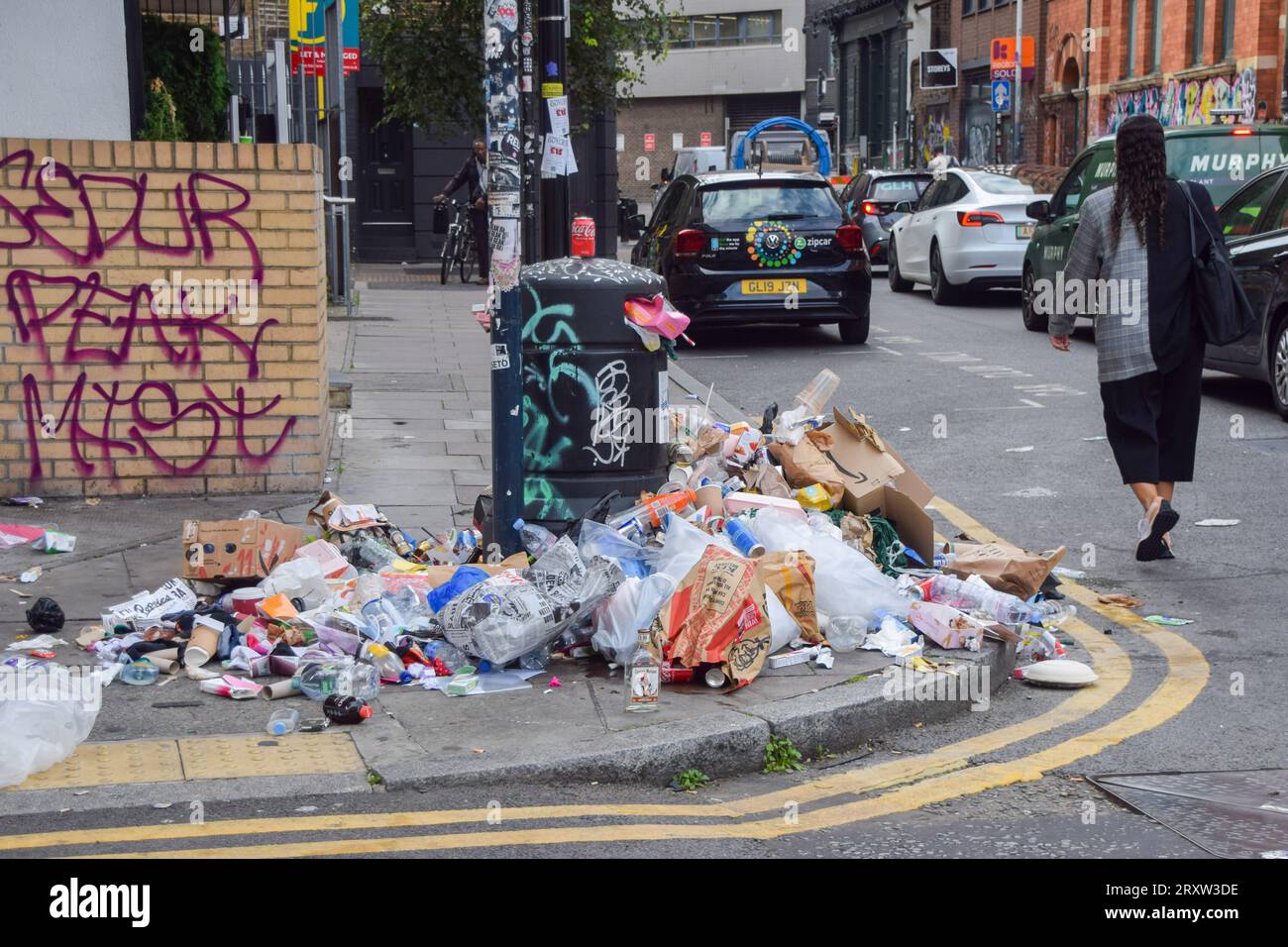 London, UK. 27th September 2023. Huge piles of garbage line the streets ...