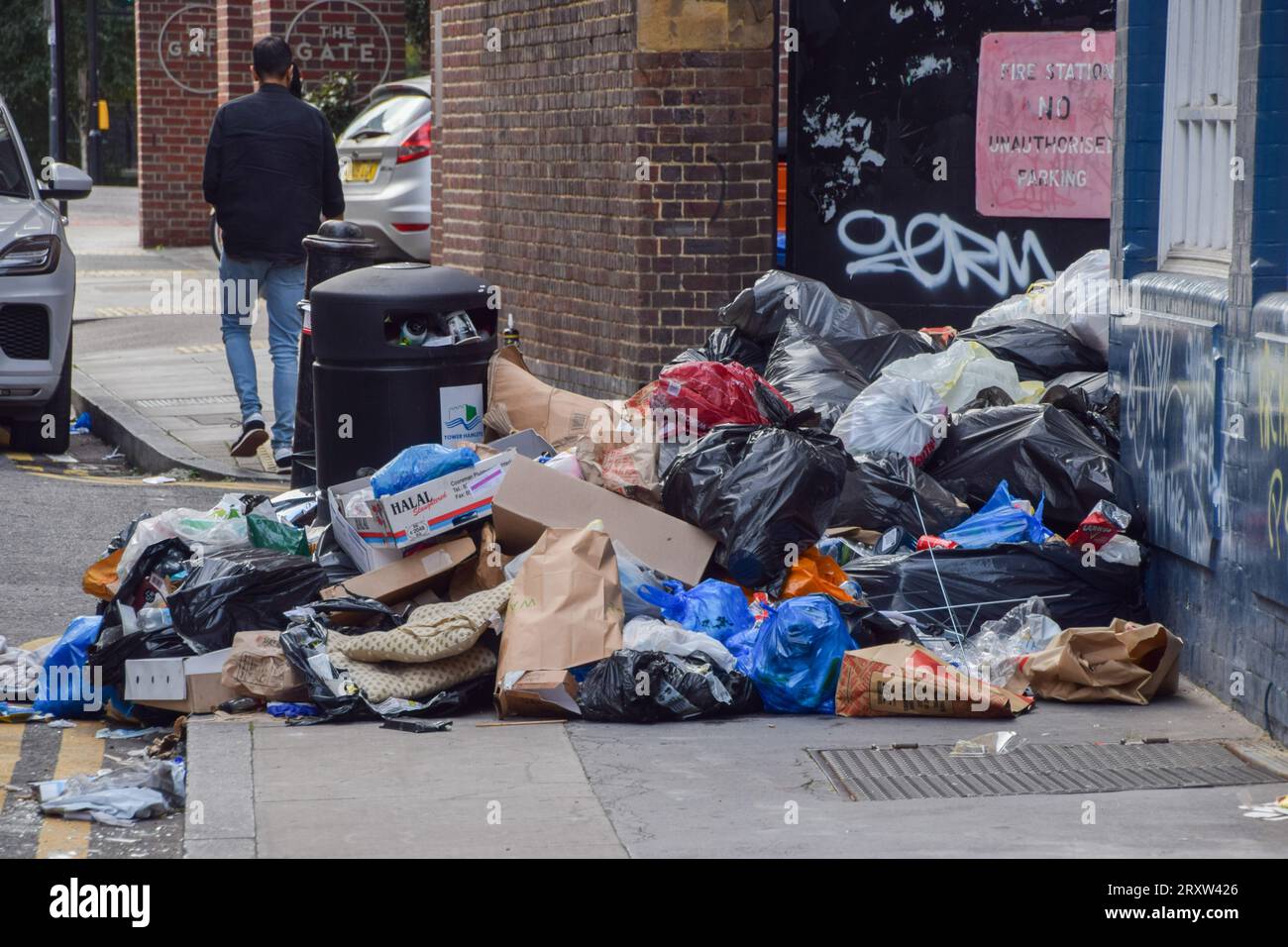 London, UK. 27th September 2023. Huge piles of garbage line the streets near Whitechapel as ...