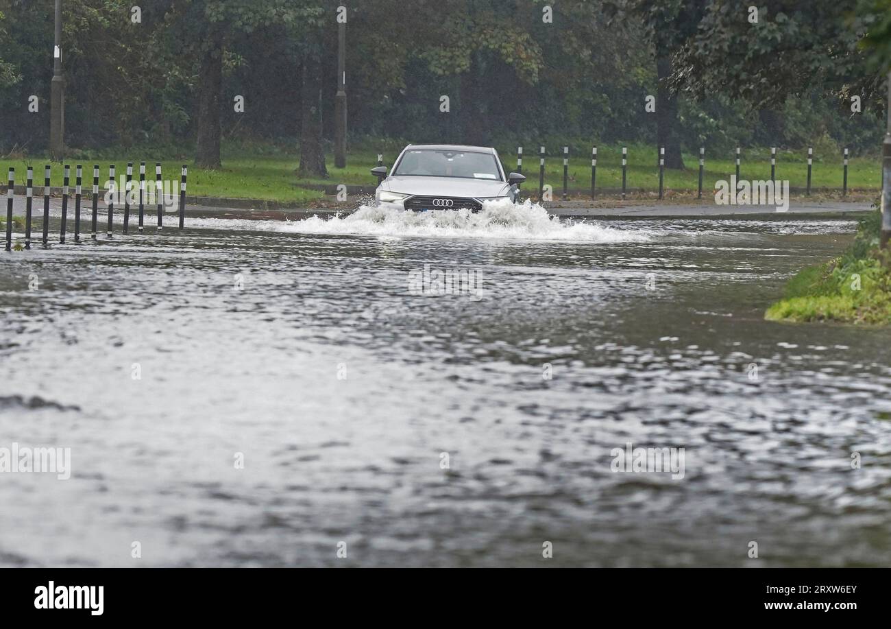 Car driving through floodwater hi-res stock photography and images - Alamy