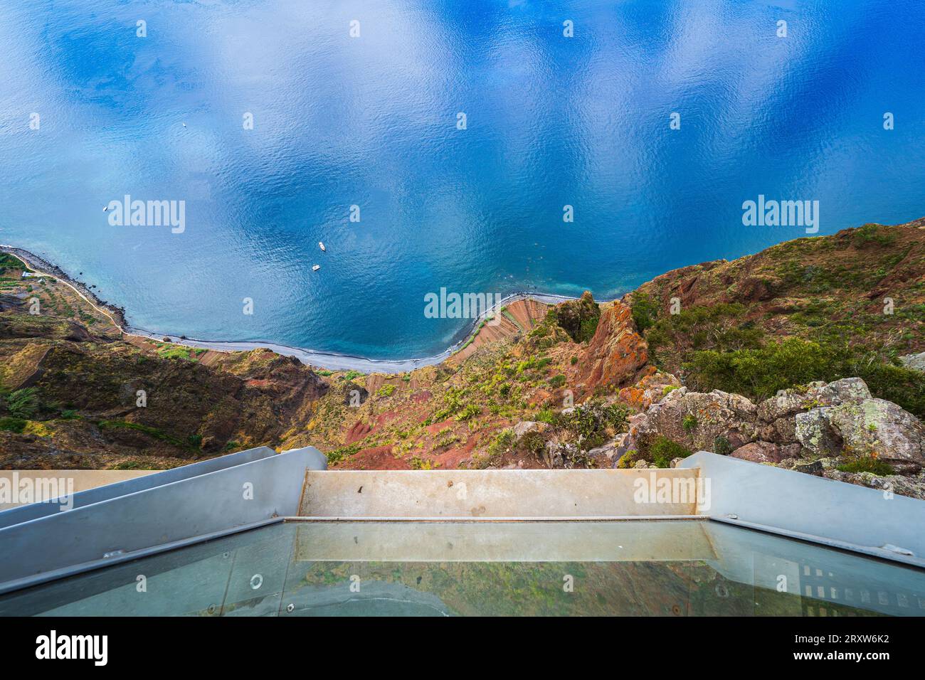 Scenic view into the depths of Europe's highest skywalk, the Cabo Girão ...