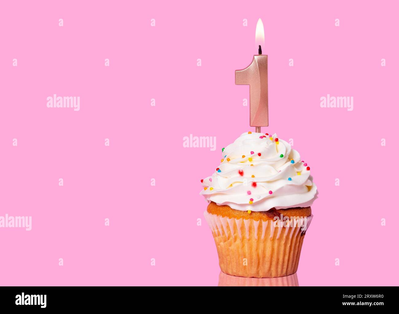 Birthday Cake With Candle Number 1 - On Pink Background Stock Photo - Alamy
