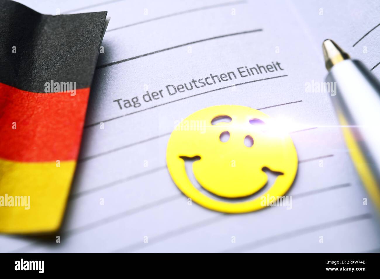 Kalenderseite Tag der Deutschen Einheit mit deutscher Fahne und Smiley ...