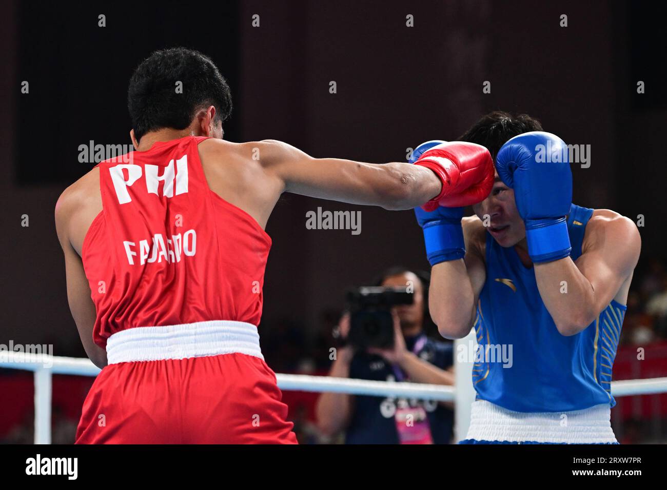 Mark Ashley Fajardo (L) of the Philippines and Xiangyang Wang of China (R) are seen during the ...