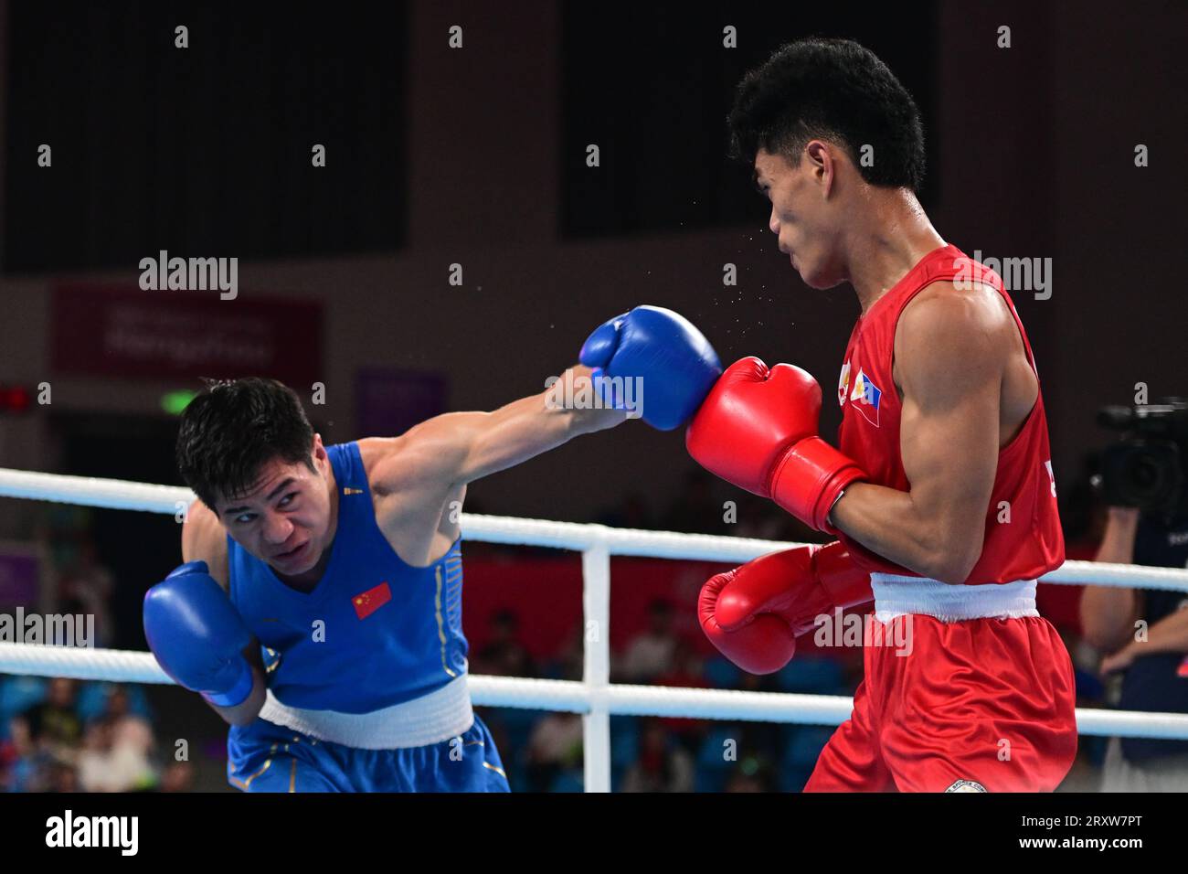 Mark Ashley Fajardo (L) of the Philippines and Xiangyang Wang of China (R) are seen during the ...
