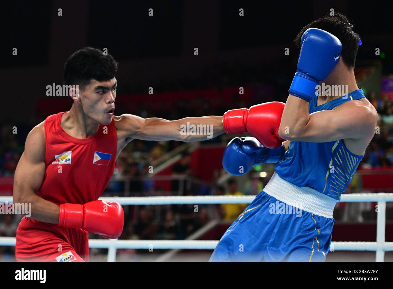 Mark Ashley Fajardo (L) of the Philippines and Xiangyang Wang of China (R) are seen during the ...