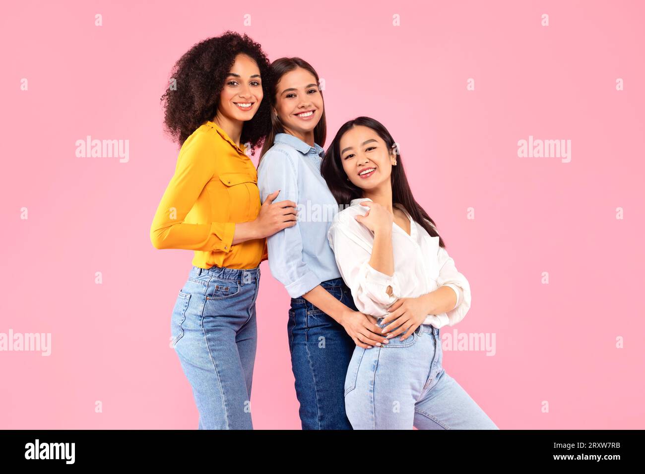 Diverse female friendship. Happy multiracial ladies embracing and ...