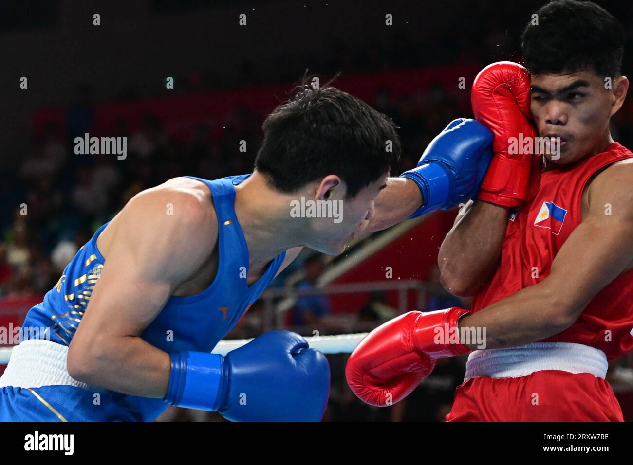 Mark Ashley Fajardo (R) of the Philippines and Xiangyang Wang of China ...