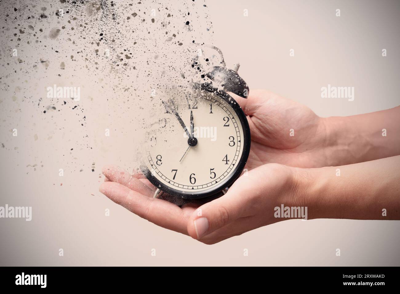Concept of passing away, the clock breaks down into pieces. Old alarm ...