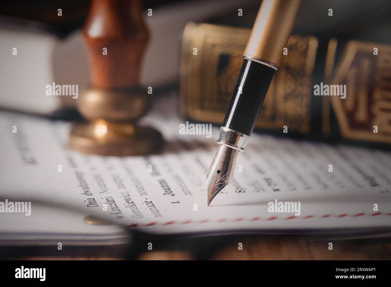Law, notary background theme. Fountain pen and documents on desk Stock ...