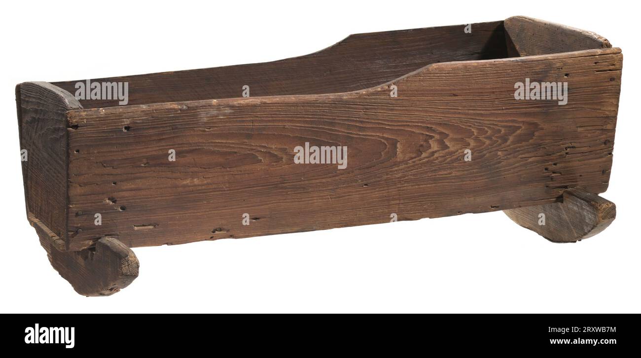 The slave-made wooden cradle consists of 5 wooden boards nailed ...